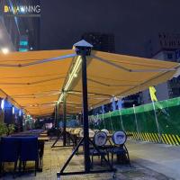 China Free Stand Double Side Waterproof Retractable Awning Hand Control Outdoor Retractable Awnings for sale