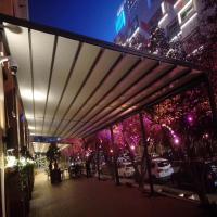 China PVC Motorized Louvered Pergola Roof Sunshade Aluminum Patio Covers for sale