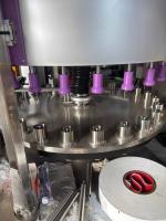 China Automatic Rotary Hot Melt Labeler for PET Glass Bottles Cans 18000-20000BPH ±1mm Accuracy for sale