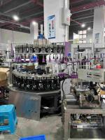 China SUS304 Stainless Steel 30-Station Rotary Hot Melt Labeling System 26000-36000 BPH for sale