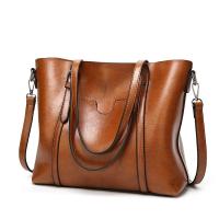 China Classic Styles In Wax PU Leather Handbags Embossed Logo for sale