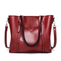 China Classic Styles In Wax PU Leather Handbags Embossed Logo for sale