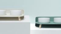 China pet dining table ceramic double bowl cat bowl to protect the cervical spine anti-overturning food bowl for sale