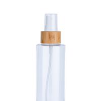 China 220ml Transparent Cylindrical Clear Bottle With White Spray For Cosmetic Bamboo Bottle for sale