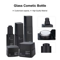 China Luxury Glass Cosmetic Packaging Bottle Skincare Set Matt Black 30ml 100ml 125ml 50g for sale