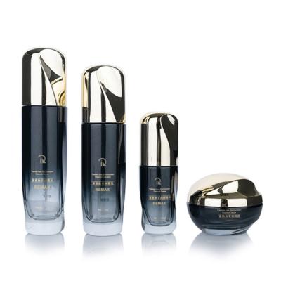 China 30g/100ml 50g/80g Glass Black and white gradient cylindrical Smooth with Golden Lid for cosmetic packaging bottle for sale