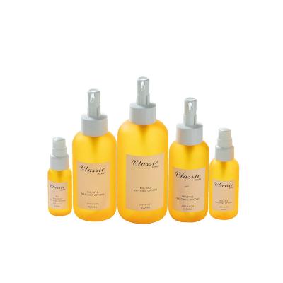China 30/60/150/200/300ml Yellow Smooth Round-shouldered bottle with white pump for shampoo lotion bottle for sale