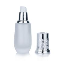 China 45ml White Glass Frosted Cylindrical Bottle With Silver Lid For Cosmetic Glass Bottles for sale