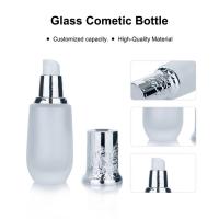 China 45ml White Glass Frosted Cylindrical Bottle With Silver Lid For Cosmetic Glass Bottles for sale
