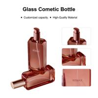 China 100ml Pink Gradient Glass Cosmetic Packaging Glass Lotion Bottle With Pump for sale