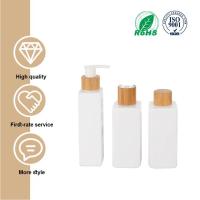 China 180ml White Lotion Cosmetic Bamboo Bottle With Bamboo Cap for sale