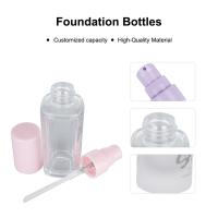 China 30ml Transparent Empty Foundation Bottle With Pink Or Purple Plastic Caps for sale