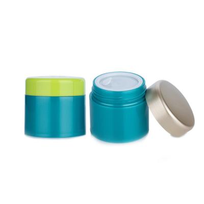 China 40ml Blue Opaque Plastic Empty Cream Jar With Silver White Green Lids for sale
