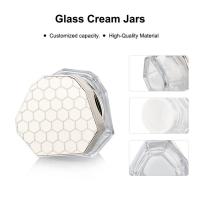 China 35g Transparent Glass Bottle Empty Cosmetic Containers With Gold Honeycomb Lid for sale