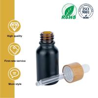 China 50ml Black Cylindrical frosted Glass Bottle With bamboo Drop For Empty Dropper Bottle for sale