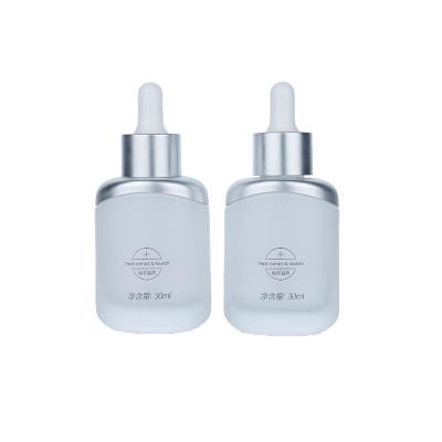 China 30ml Silver Glass Dropper Bottles Transparent Elegant Glass Eye Dropper Bottles for sale