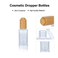 China 30ml Transparent Rectangle Frosted Glass Bottle With Bamboo Lid For Empty Dropper Bottle for sale