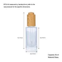 China 30ml Transparent Rectangle Frosted Glass Bottle With Bamboo Lid For Empty Dropper Bottle for sale