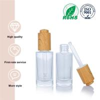 China 30ml Transparent Rectangle Frosted Glass Bottle With Bamboo Lid For Empty Dropper Bottle for sale