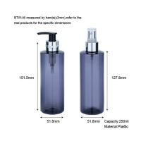 China 250ml Plastic blue transparent smooth cylindrical bottle with silver pump/spray for empty oil cosmetic bottle for sale