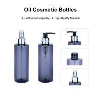 China 250ml Plastic blue transparent smooth cylindrical bottle with silver pump/spray for empty oil cosmetic bottle for sale