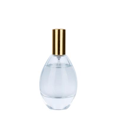 China 50ml Transparent Glass Clear Cylindrical Bottle With Golden Lid For Empty Cosmetic Glass Bottles for sale