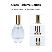 China 50ml Transparent Glass Clear Cylindrical Bottle With Golden Lid For Empty Cosmetic Glass Bottles for sale