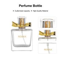 China Luxury 50ml Glass Perfume Bottle 10000pcs With Gold Bow Cap for sale