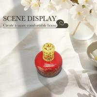 China Luxury 100ml Glass Packing Red Green Traditional Pattern Round Catalytic Aromatherapy Lamp for sale