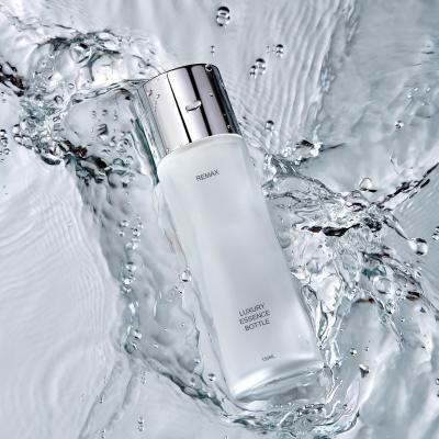 China Modern Elegant 30ml 50ml Cosmetic Packaging Bottle White Frosted And Silver Cap for sale