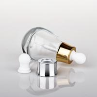 China Functional Cosmetic Dropper Bottles 30ml Thick Glass Bottle with Gold Dropper for sale