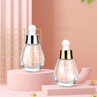 China Functional Cosmetic Dropper Bottles 30ml Thick Glass Bottle with Gold Dropper for sale