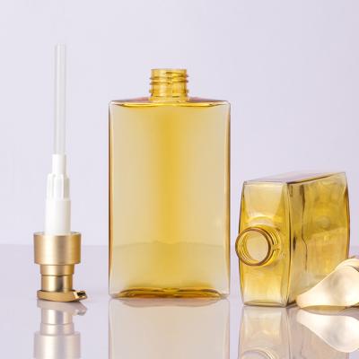 China 200ml PP Yellow Transparent rectangle smooth with Golden pump for shampoo lotion bottle for sale