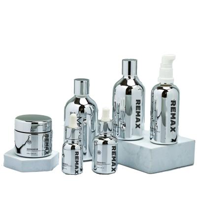 China 60g Cream Jar 20ml 30ml 100ml 120ml 150ml Pump Bottle Silver-Plated Bright Glass Skincare Lotion and Essence Set for sale