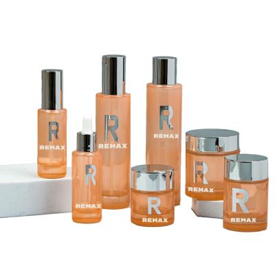 China Wholesale Multiple Capacities Silver Plated Logo Customized Transparent Glass Lotion Pump Bottle Jar Cosmetics Package Set for sale