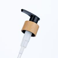 China 24/410 Black Wood Grain Water Transfer Printing Lotion Pump Is Used for Shower Gel and Moisturizer Bottles for sale