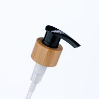China 24/410 Black Wood Grain Water Transfer Printing Lotion Pump Is Used for Shower Gel and Moisturizer Bottles for sale