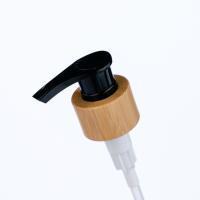 China 24/410 Black Wood Grain Water Transfer Printing Lotion Pump Is Used for Shower Gel and Moisturizer Bottles for sale