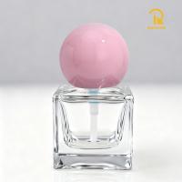 China 30ml Clear Square Glass Bottle for Lotion and Serum with Round Lid for sale
