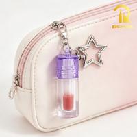 China 0.5g Clear Lip Gloss Tube with Purple Cap & Applicator Brush for sale