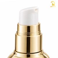 China 50ml Round Gold Cosmetic Pump Bottle Empty Lotion Container For Face Moisturizer Serum Skincare Liquid Custom Printed Packaging for sale
