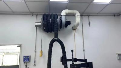 China Spring Drived Vehicle Exhaust Extracting Hose Reel Fixed On Wall With Dual Pipes 1.5kw for sale