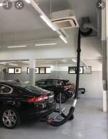 China Spring Drived Vehicle Exhaust Extracting Hose Reel Fixed On Wall With Dual Pipes 1.5kw for sale