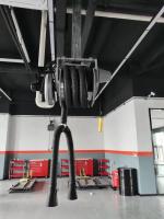 China Spring Drived Vehicle Exhaust Extracting Hose Reel Fixed On Wall With Dual Pipes 1.5kw for sale