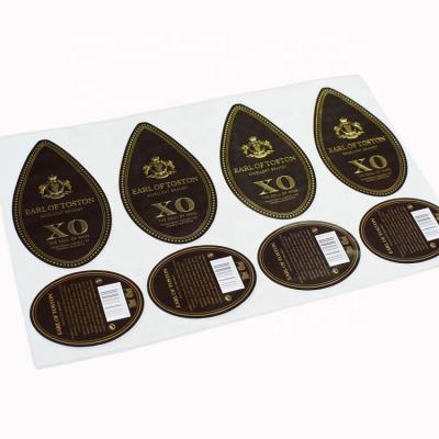 China Glossy Rolled Self Adhesive Wine Bottle Label Printing Waterproof for sale