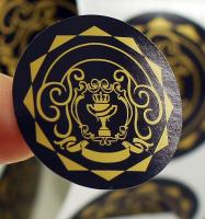 China Printed Name Brand Logo Stickers Waterproof Gold Foil Round Labels for sale