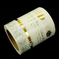China Gold Foil Hot Stamp Label Printing Self Adhesive Transparent Packaging Label Stickers for sale