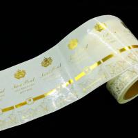 China Gold Foil Hot Stamp Label Printing Self Adhesive Transparent Packaging Label Stickers for sale
