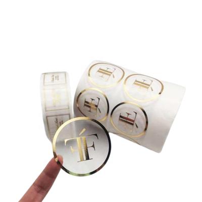 China Customized Printing Gold Foil Circle Stickers LOGO Self Adhesive Clear Vinyl Transparent for sale