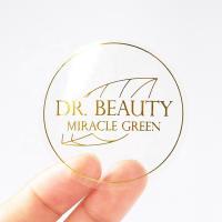 China Custom Printing Roll Transparent Labels Clear Gold Foil Self Adhesive Sticker for sale